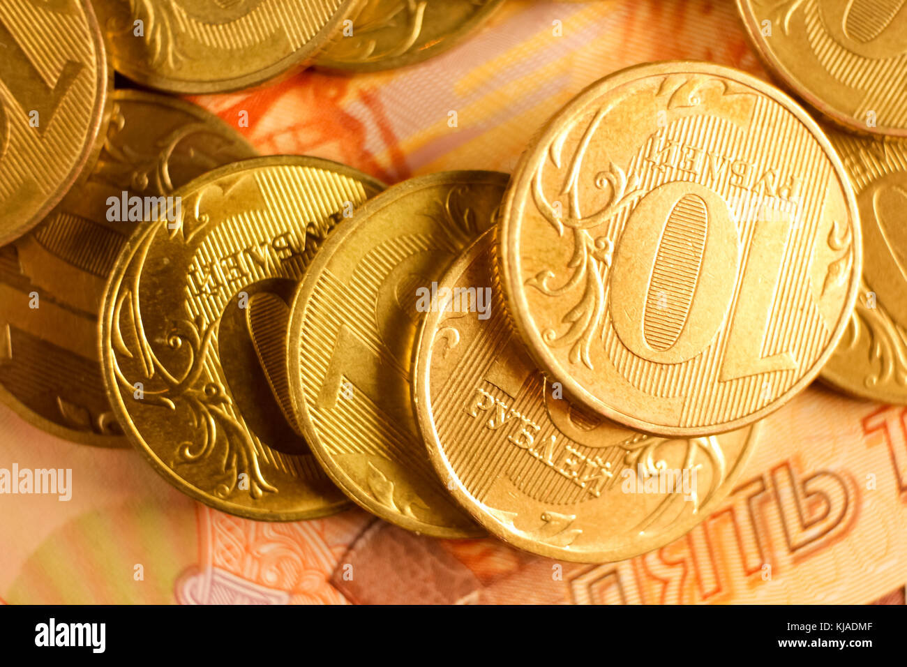 Set of russian ruble coins laying on russian banknotes. Russian ...