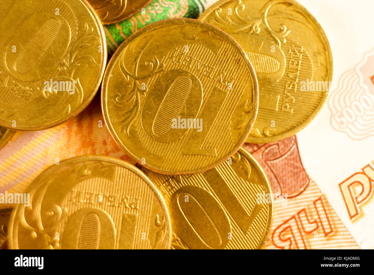 Set of russian ruble coins laying on russian banknotes. Russian ...