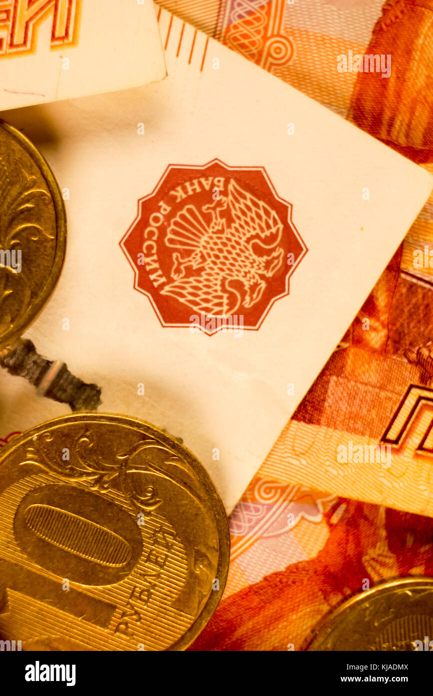 Set of russian ruble coins laying on russian banknotes. Russian ...