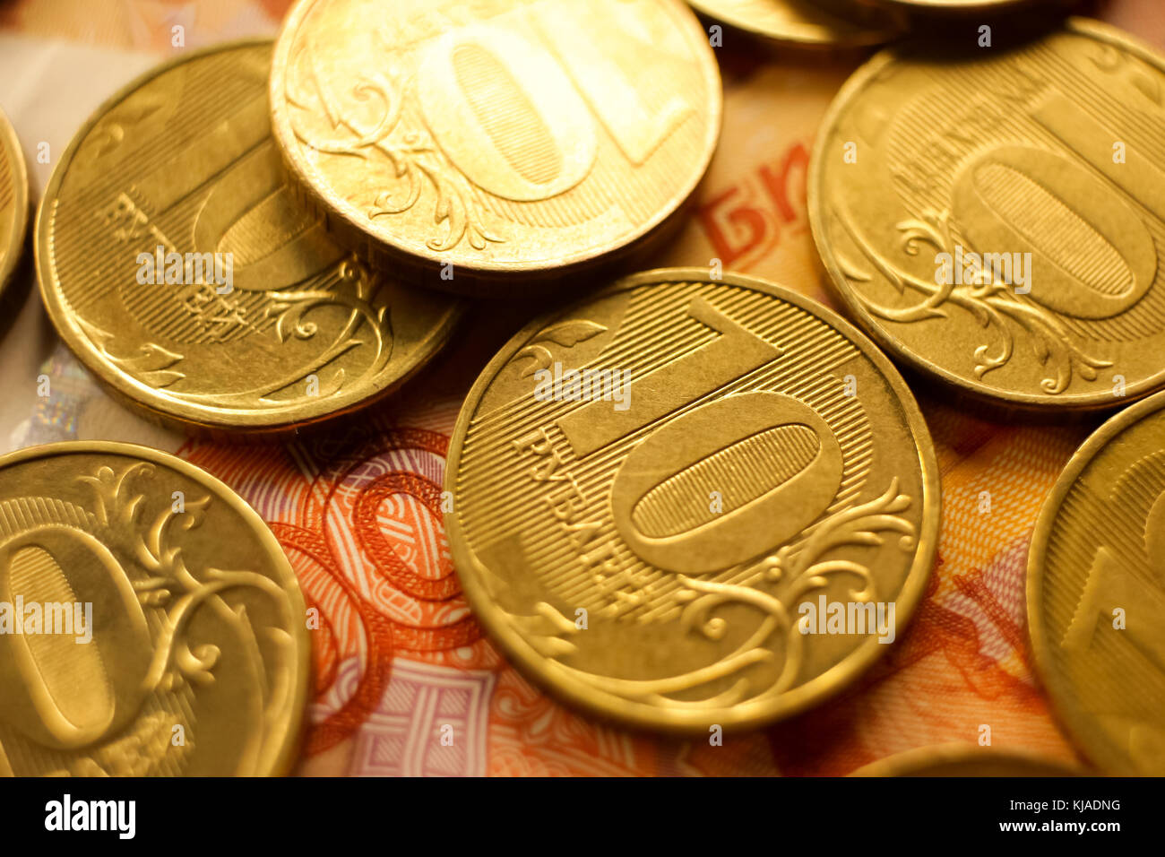 Set of russian ruble coins laying on russian banknotes. Russian ...