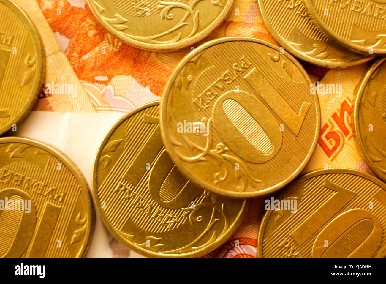 Set of russian ruble coins laying on russian banknotes. Russian ...