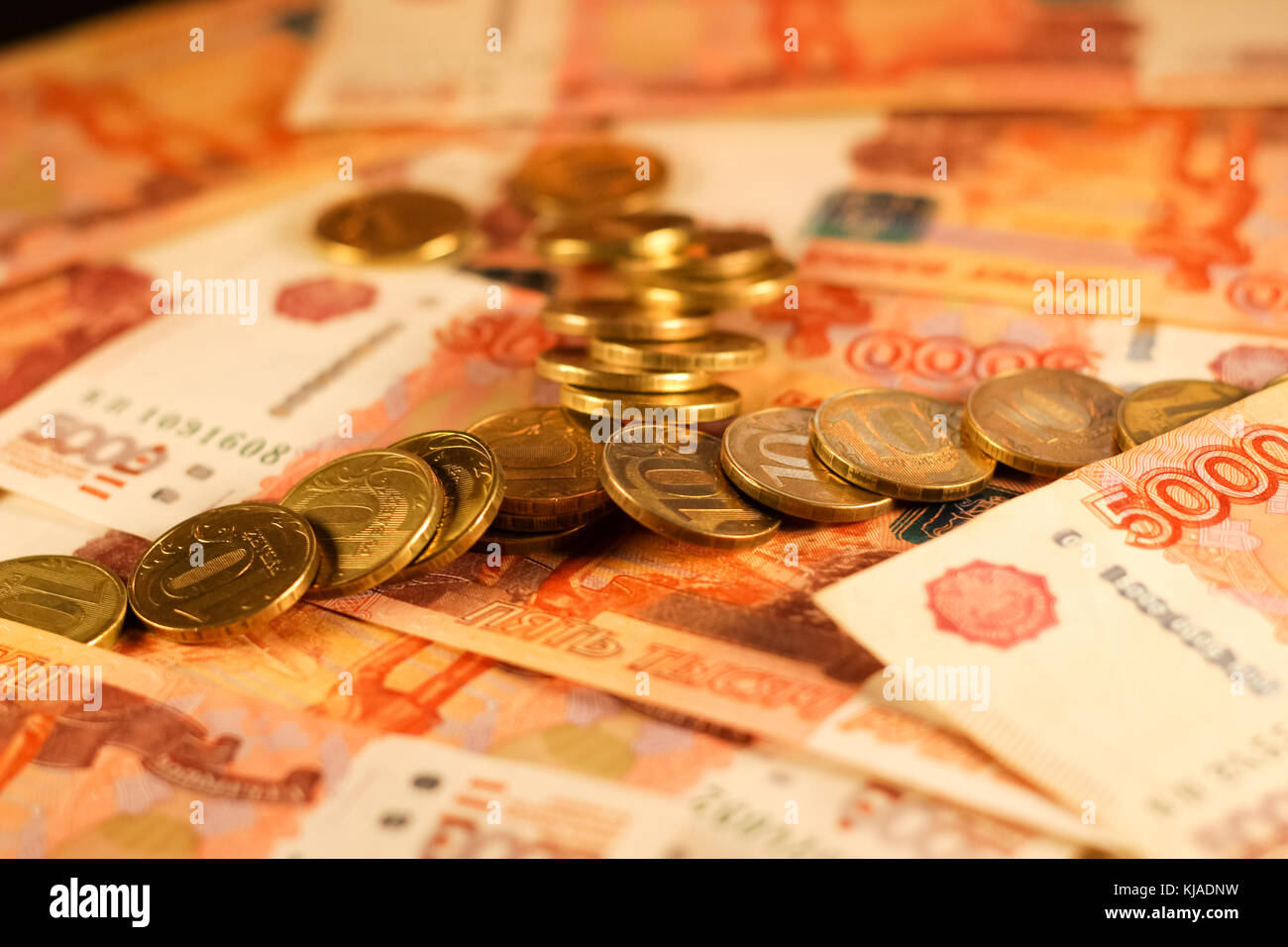 Set of russian ruble coins laying on russian banknotes. Russian ...