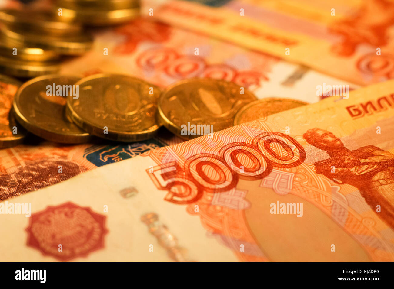 Set of russian ruble coins laying on russian banknotes. Russian ...