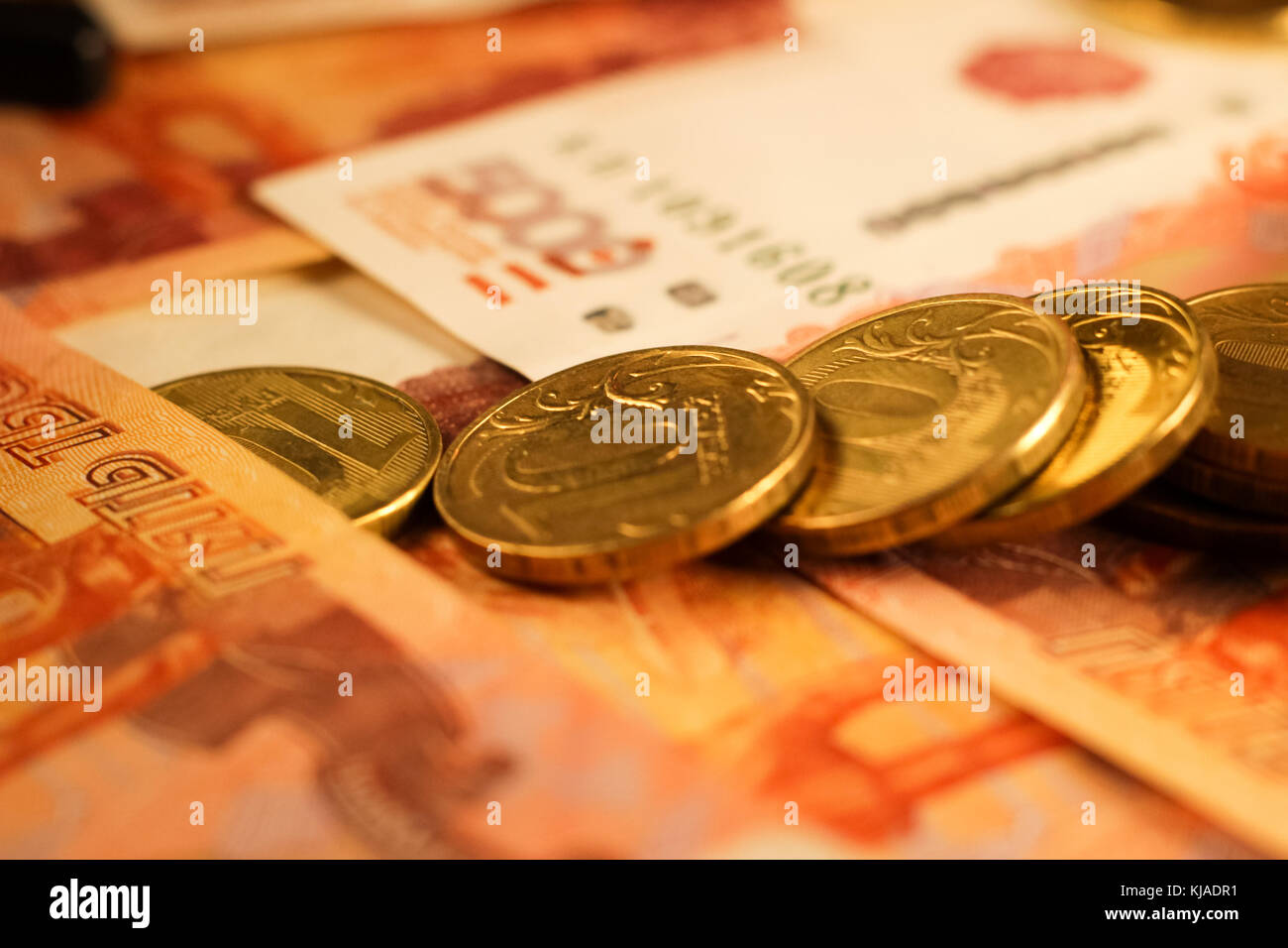 Set of russian ruble coins laying on russian banknotes. Russian ...