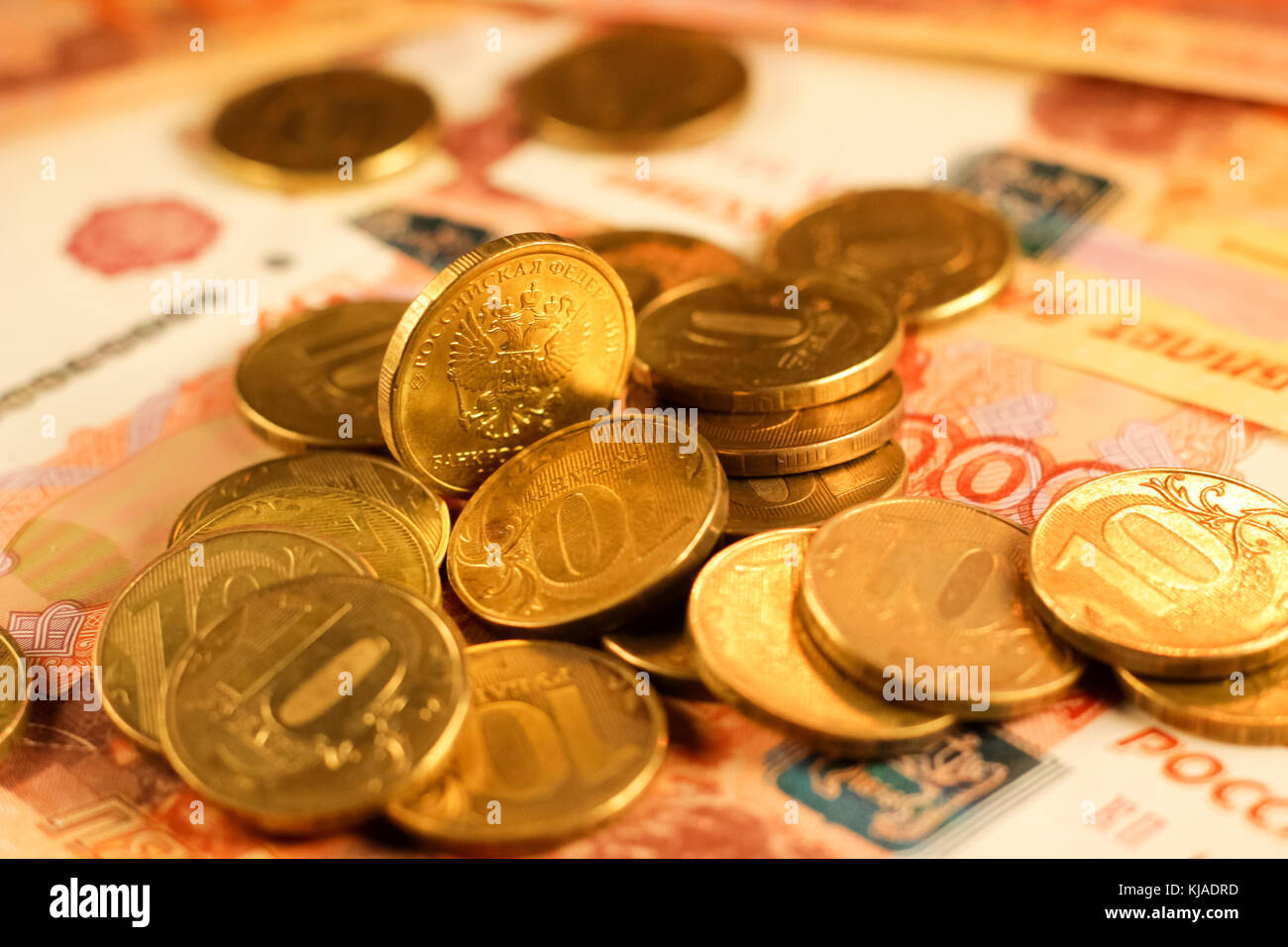 Set of russian ruble coins laying on russian banknotes. Russian ...