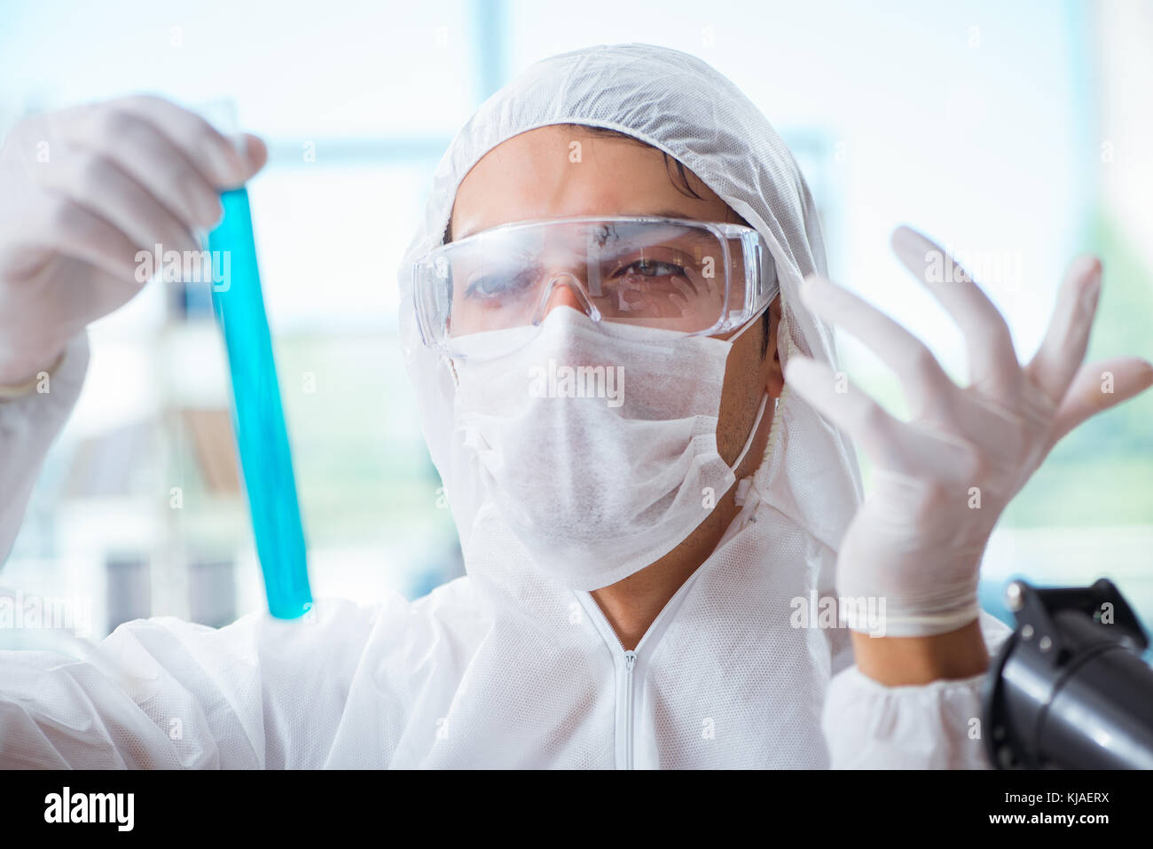 Chemist working in the laboratory with hazardous chemicals Stock Photo ...