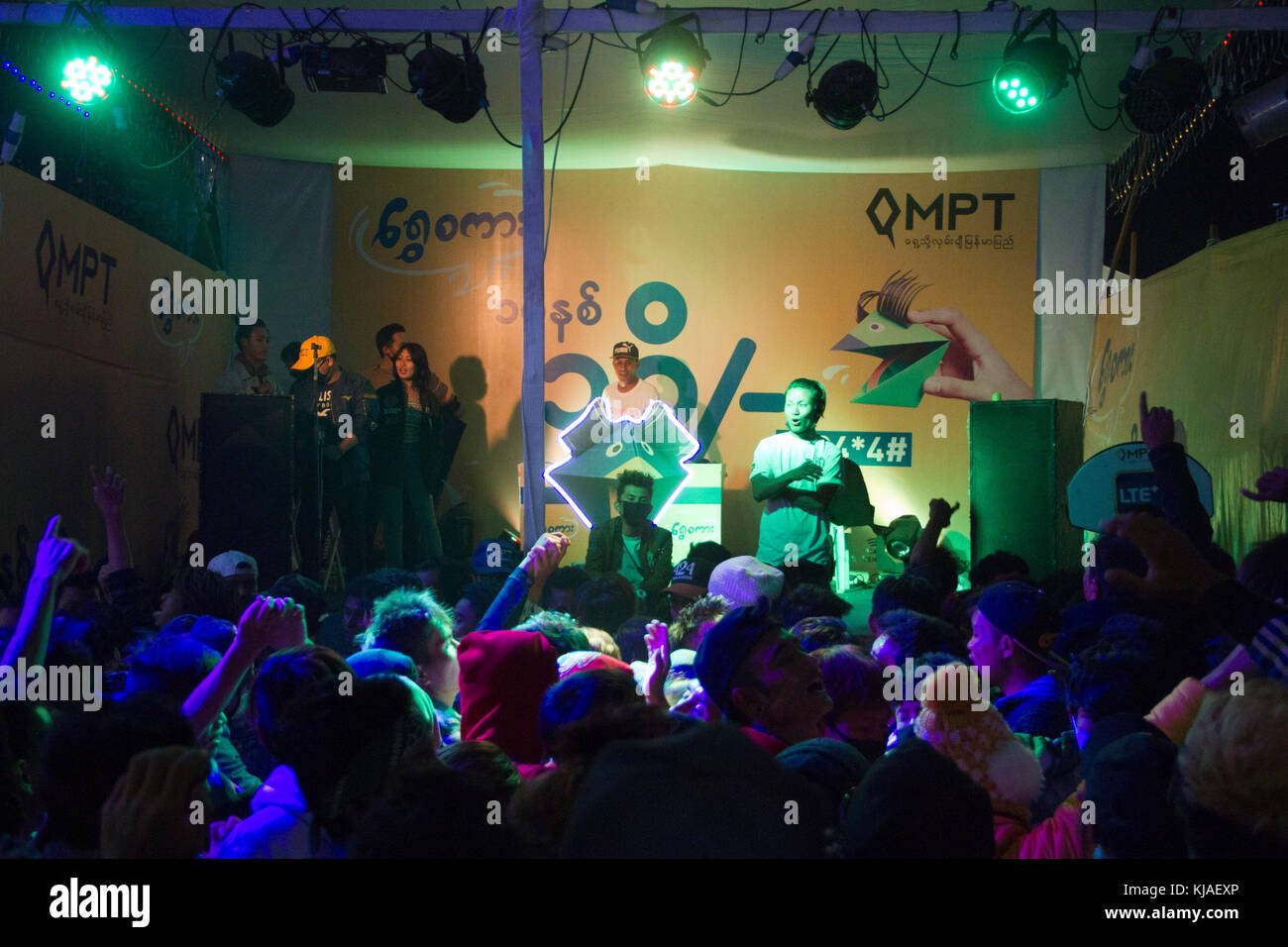 Young men dance at a DJ tent during the annual Taunggyi Fire Balloon ...