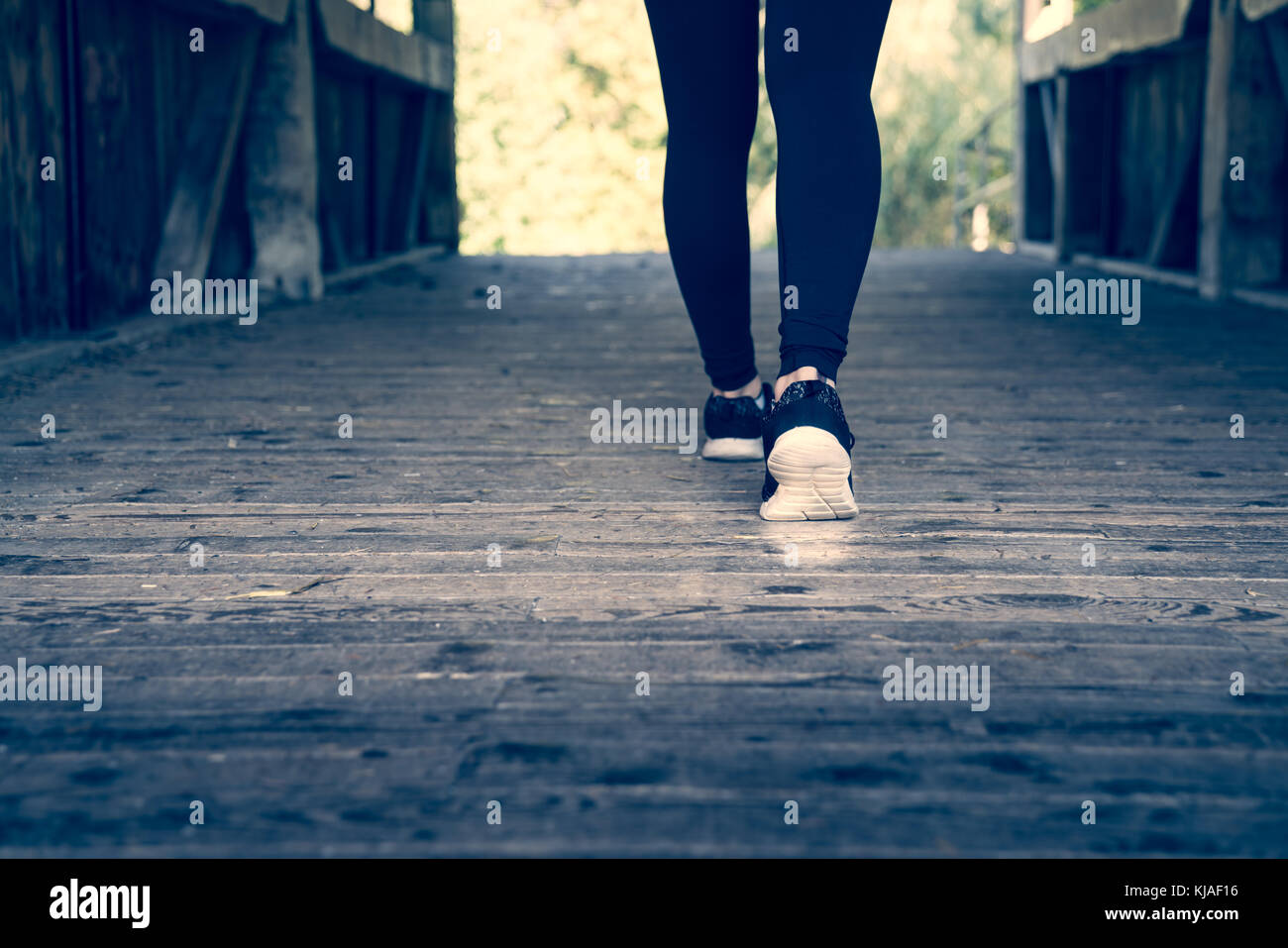 Stepping forward, getting ready to run Stock Photo - Alamy