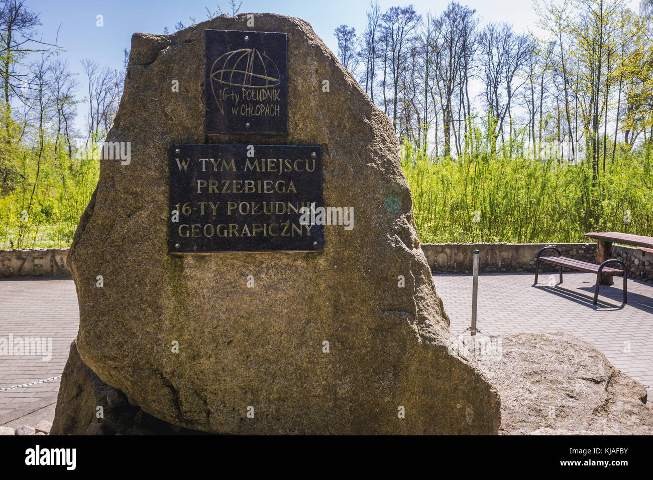 A large stone marked 16th meridian east Chlopy village in Koszalin ...
