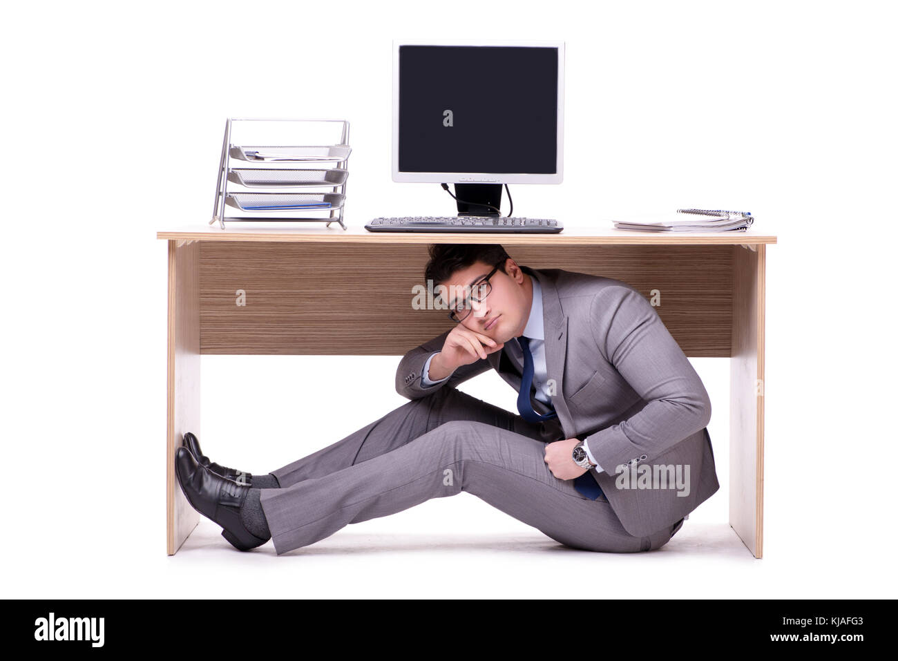 Person hiding under desk hi-res stock photography and images - Alamy