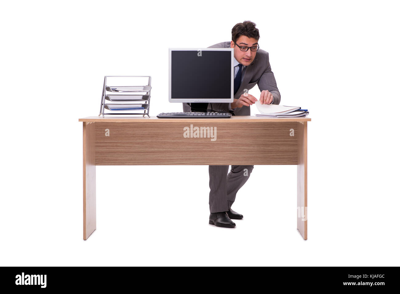 Businessman hiding in the office isolated on white Stock Photo - Alamy