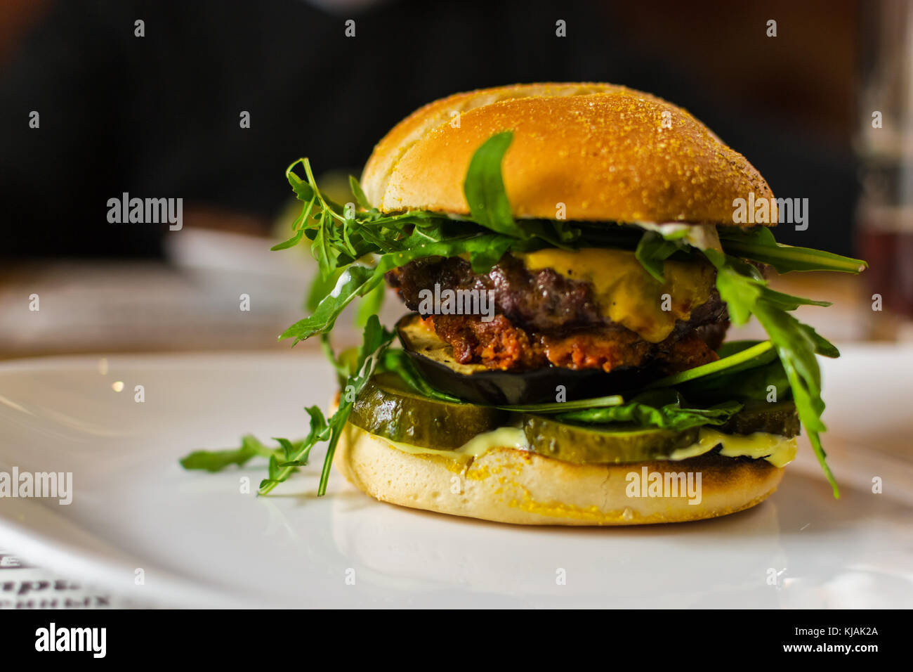 Cheeseburger on a plate Stock Photo - Alamy