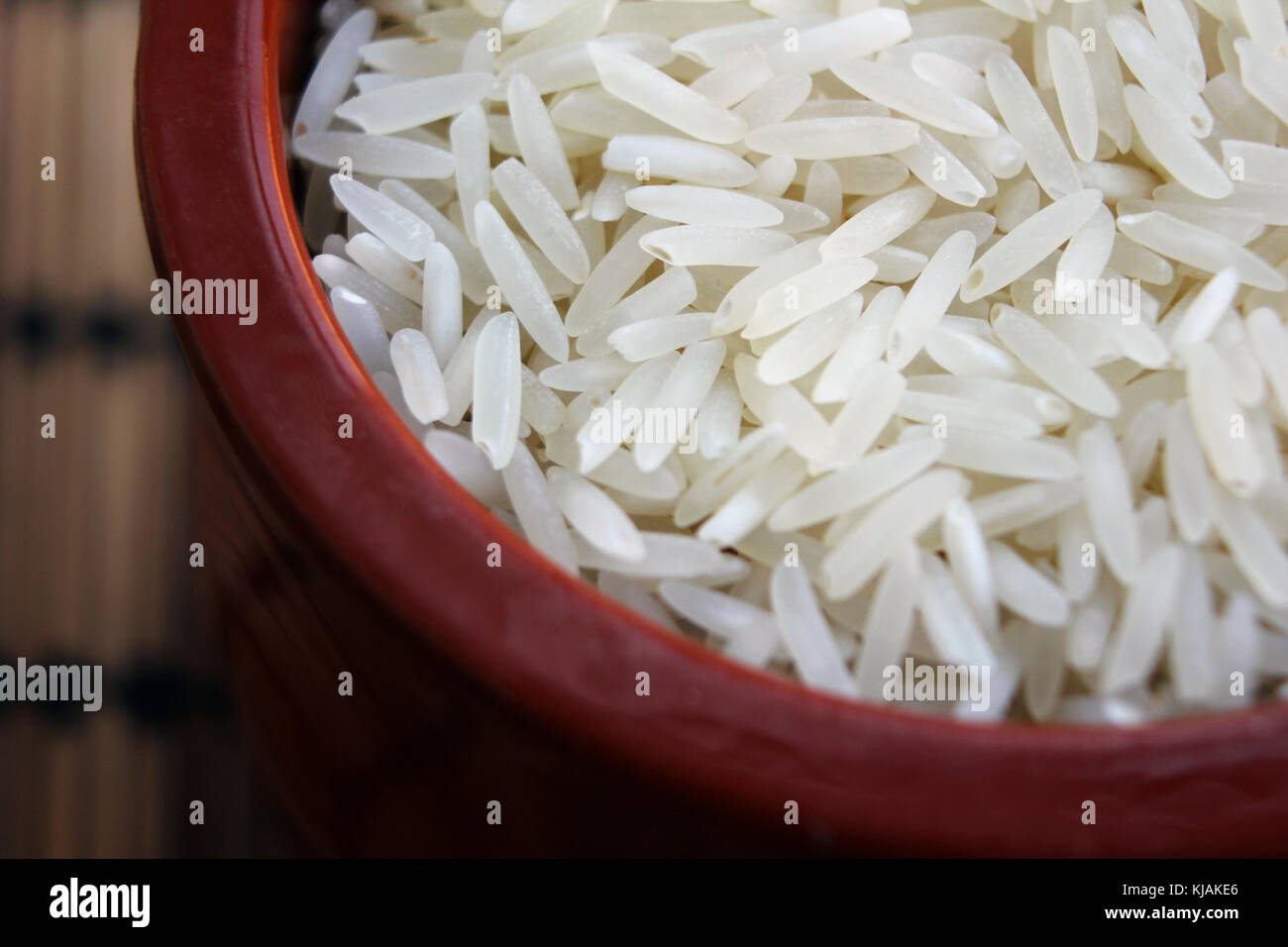 Bowl filled with white raw basmati rice grains, close-up Stock Photo ...