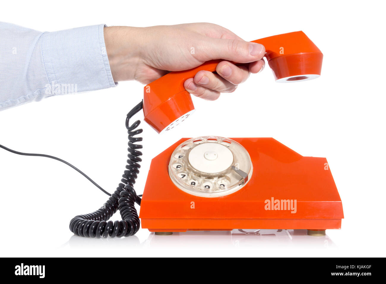 A hand picking up a phone, isolated white background Stock Photo - Alamy