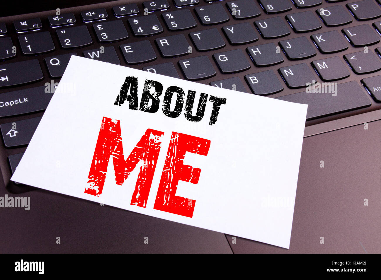 Writing About Me text made in the office close-up on laptop computer ...