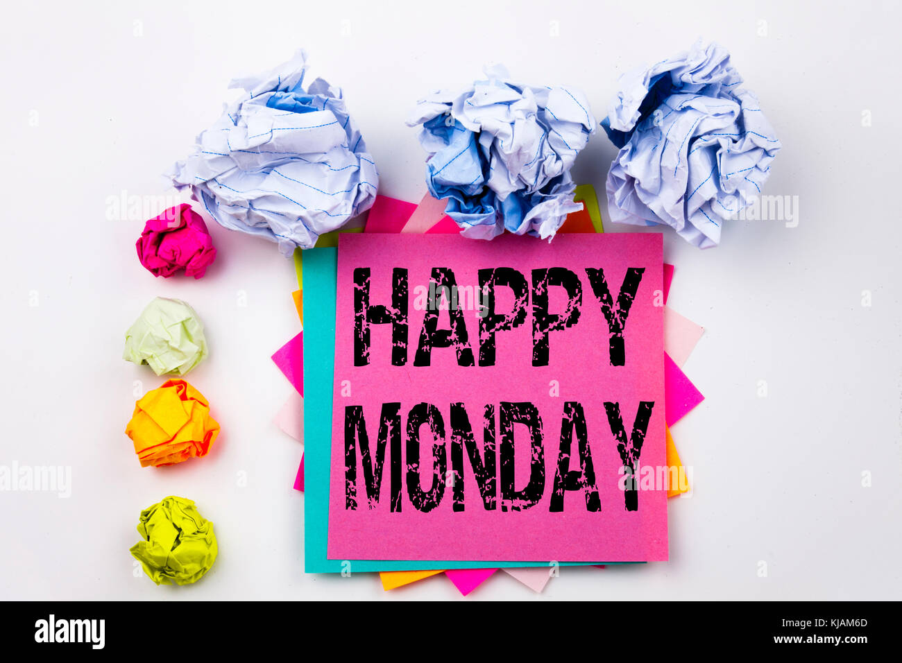 Happy Monday text written on tablet, computer in the office with marker ...