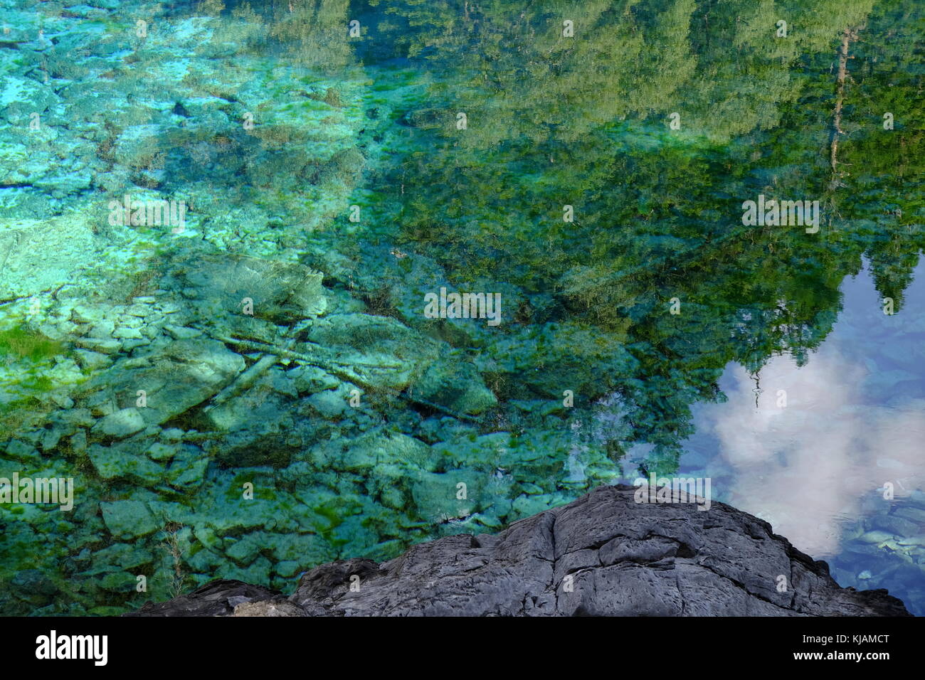 Colors of the Five-Color Pond in Jiuzhaigou valley Stock Photo - Alamy