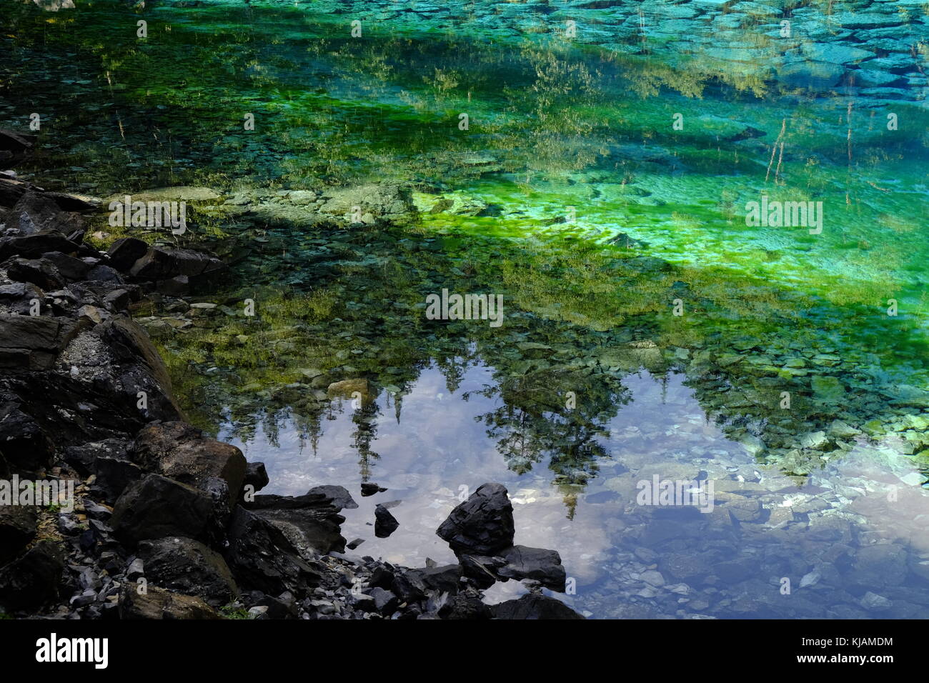 Colors of the Five-Color Pond in Jiuzhaigou valley Stock Photo - Alamy