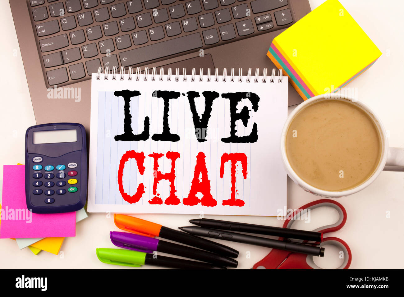 Word writing Live Chat in the office with surroundings such as laptop ...