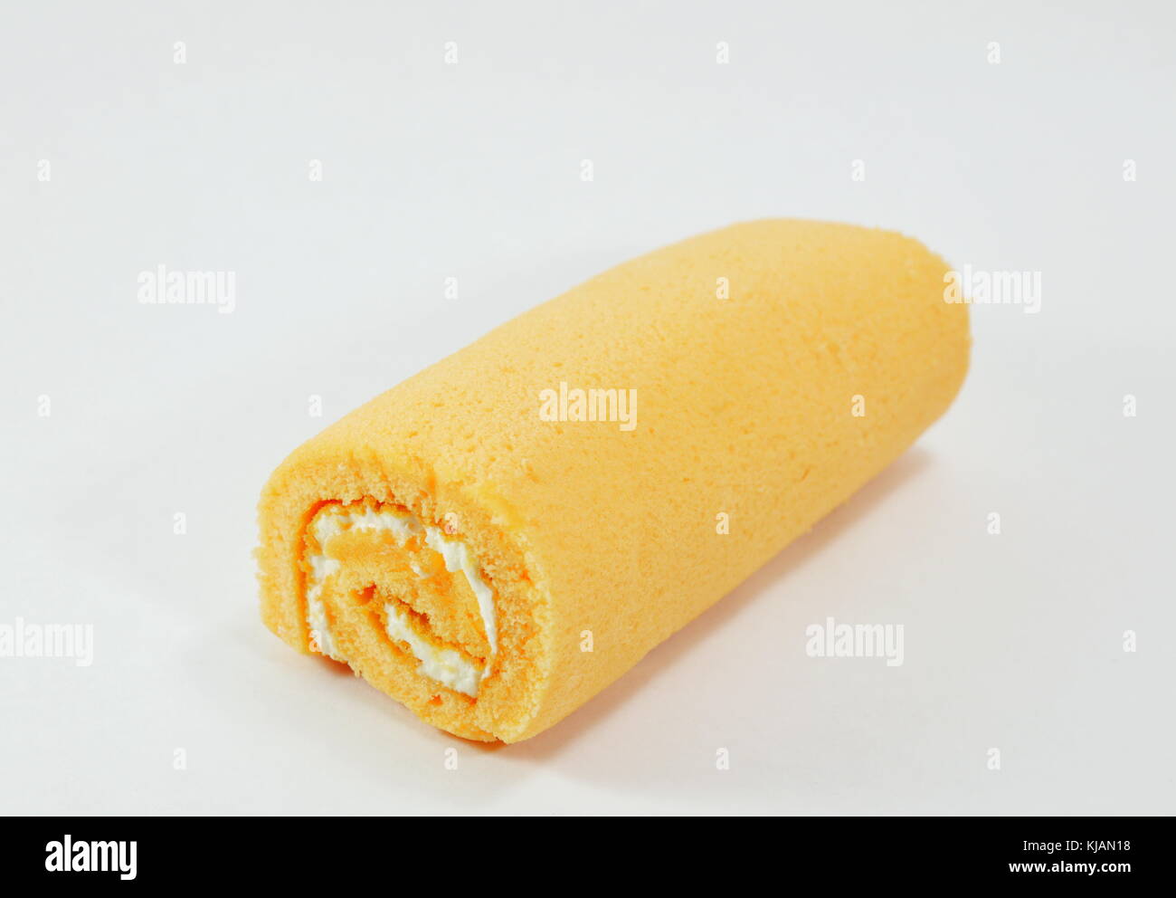 orange jam roll on white background Stock Photo - Alamy