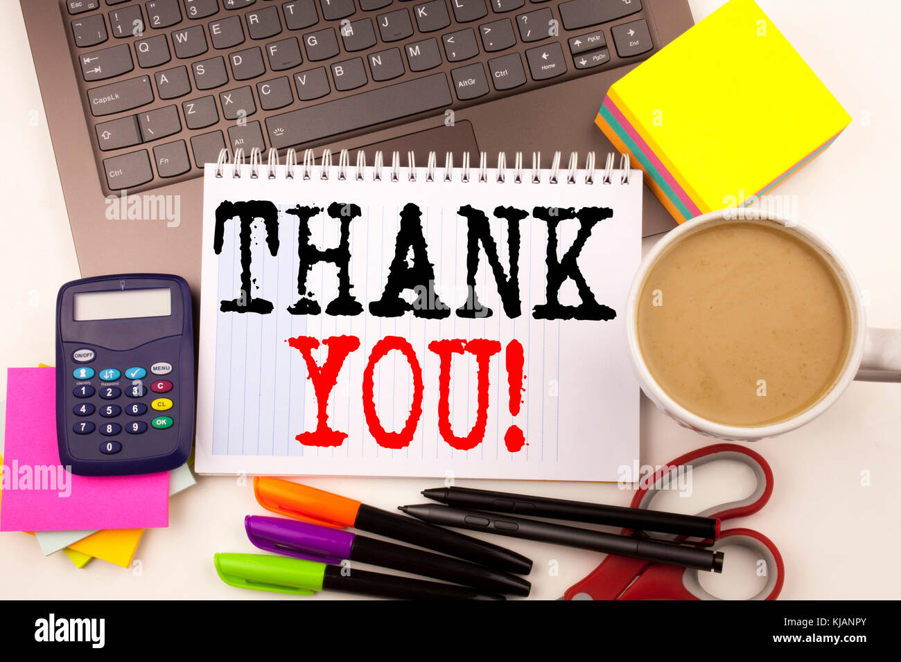 Word writing Thank You in the office with surroundings such as laptop ...