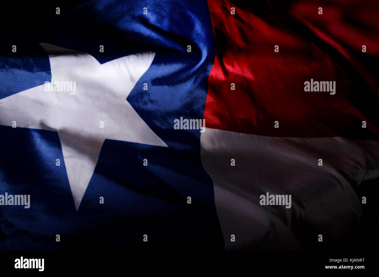 The Texas state flag waving in shadow Stock Photo - Alamy