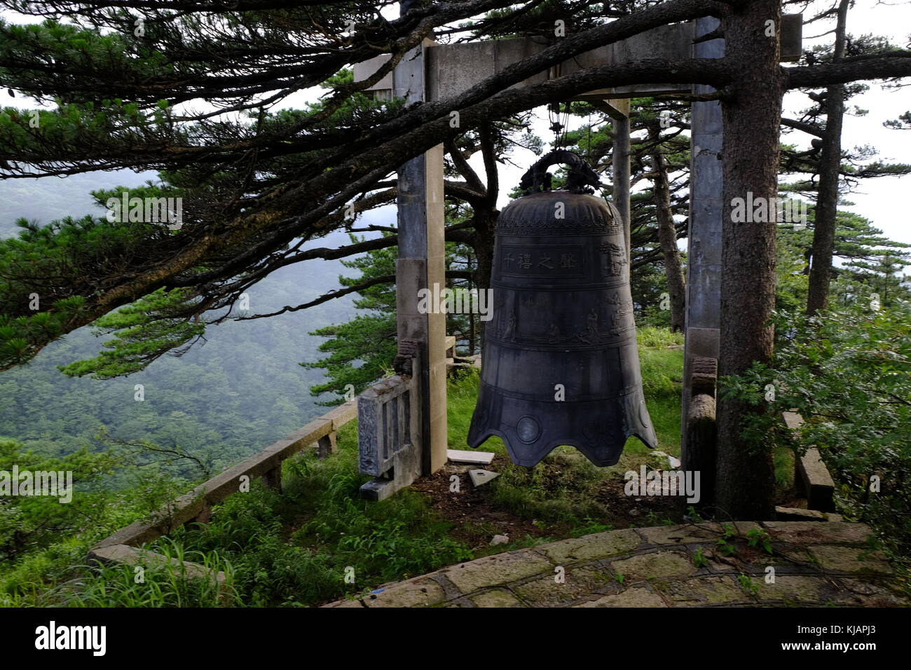 Ancient Chinese bell hidden in the forest at the Huangshan mountains in ...