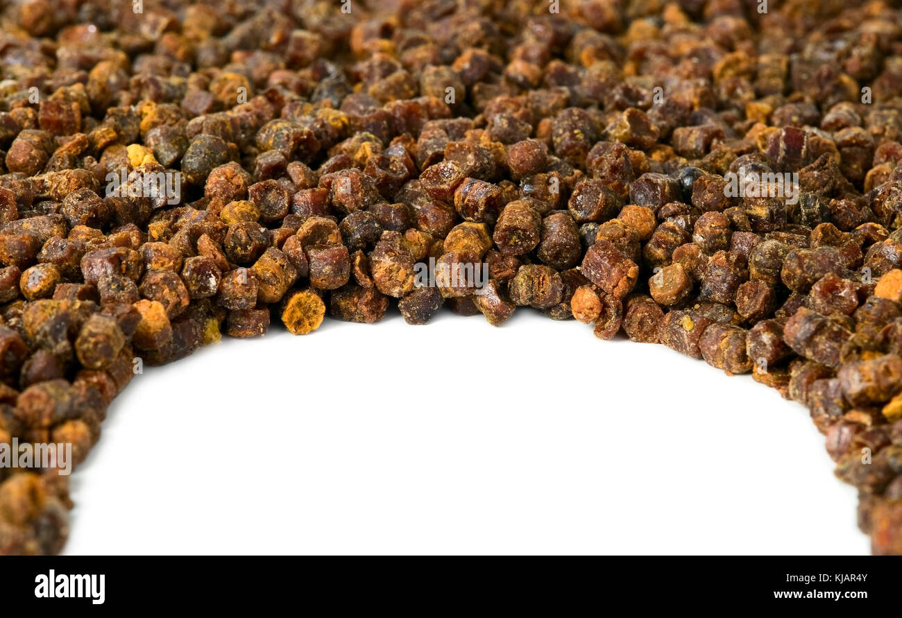 Propolis granules on white background, bee product, frame composition ...