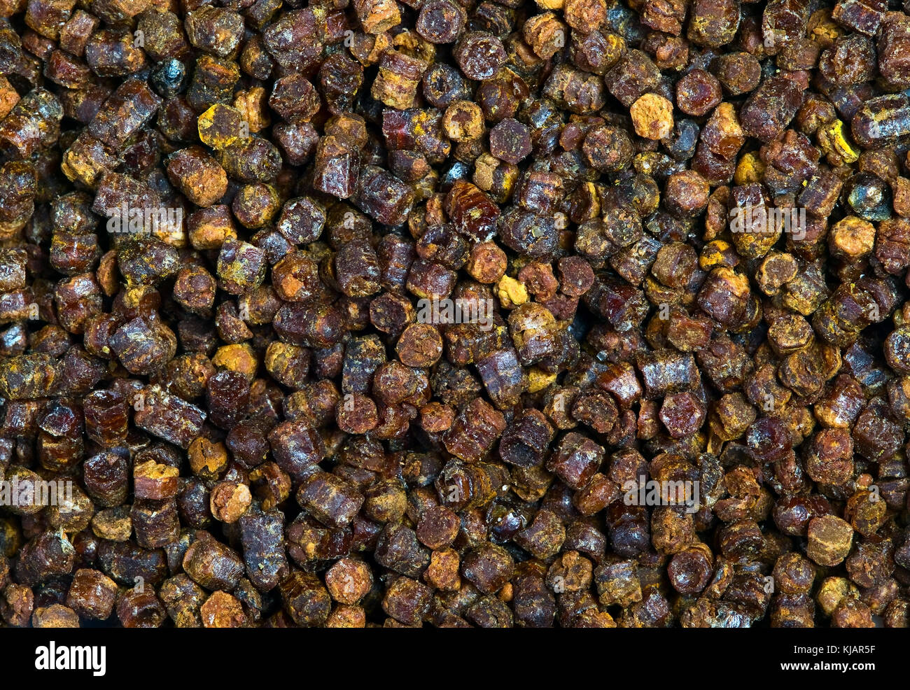 Propolis granules grunge texture background, bee product Stock Photo ...