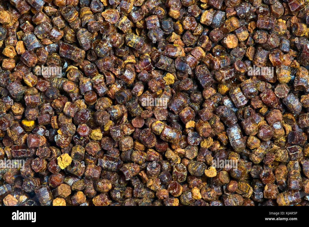 Propolis granules grunge texture background, bee product Stock Photo ...