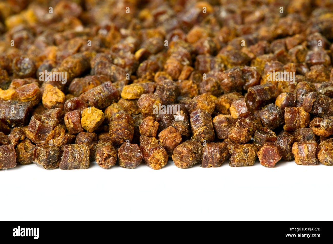 Propolis granules on white background, bee product, frame composition ...
