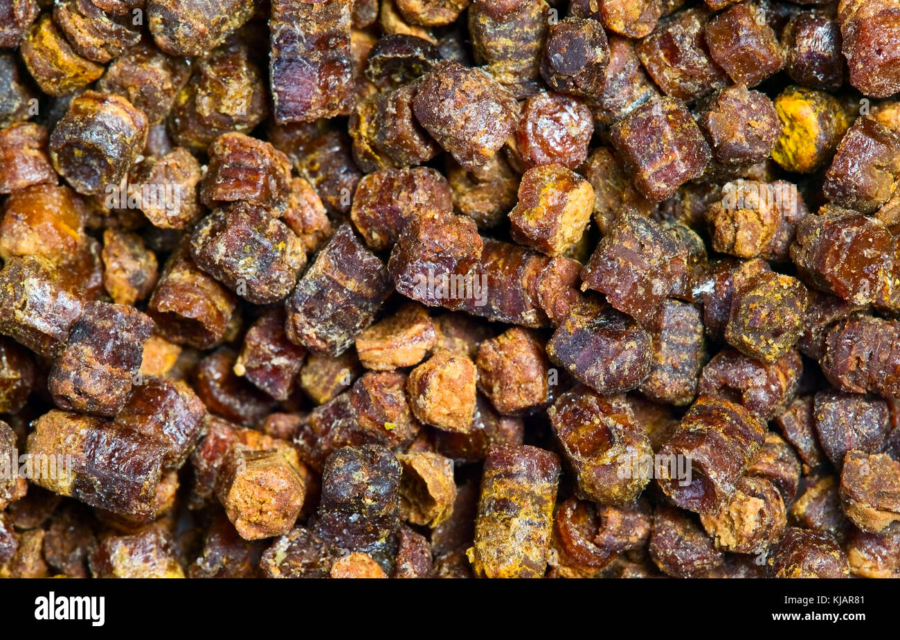 Propolis granules grunge texture background, bee product Stock Photo ...