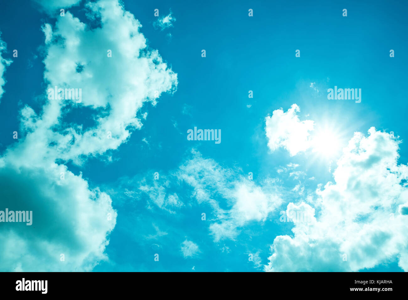 Bright blue Sky with some clouds Stock Photo - Alamy