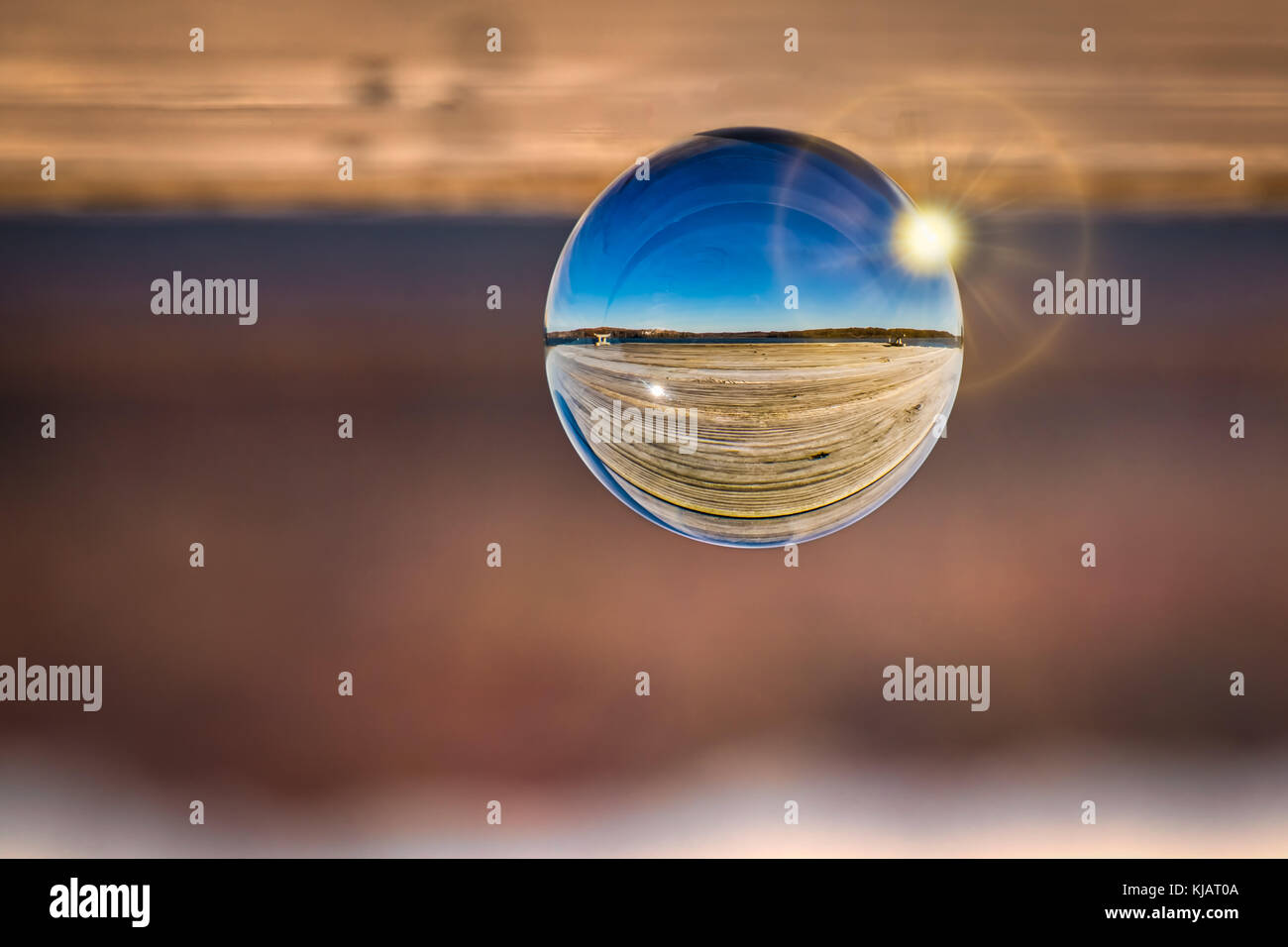 Glass ball sun hi-res stock photography and images - Alamy