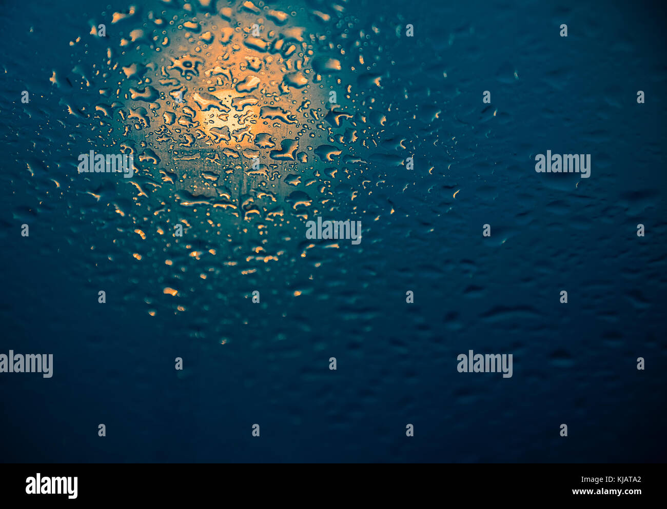 View the moon through a wet window Stock Photo - Alamy
