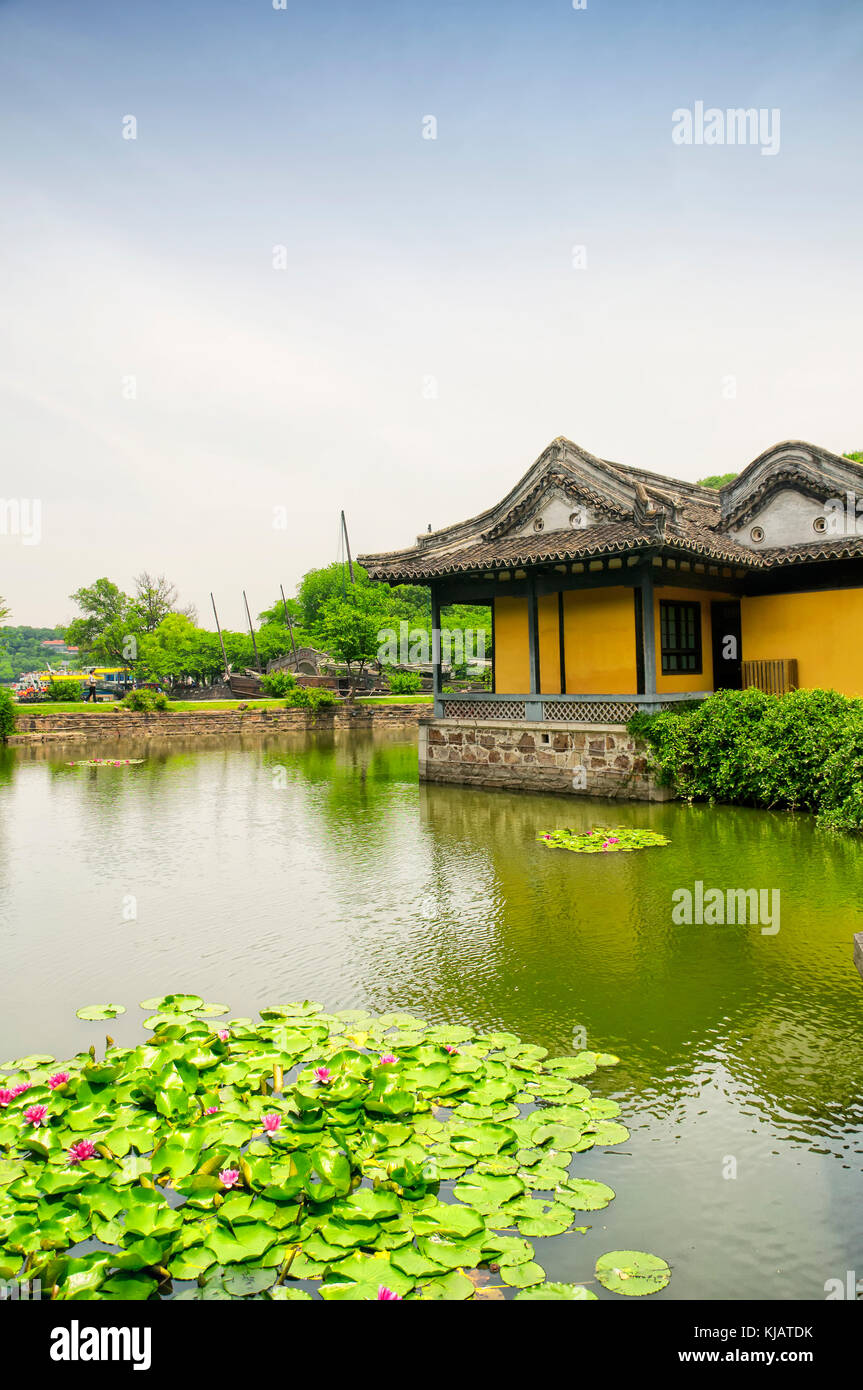 A chinese building on a small lily pond within the Lake Tai or Taihu scenic area on Turtle ...