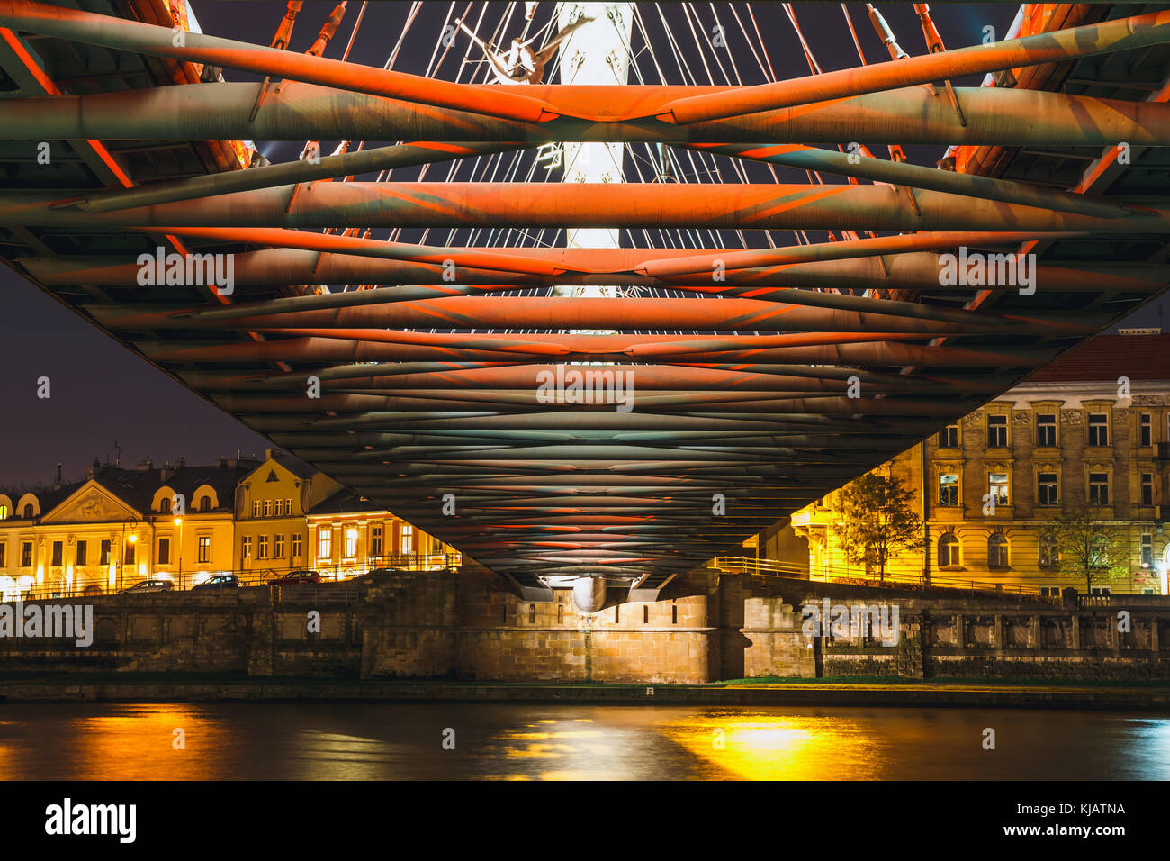 Bernatka footbridge over Vistula river in the night in Krakow, Poland ...