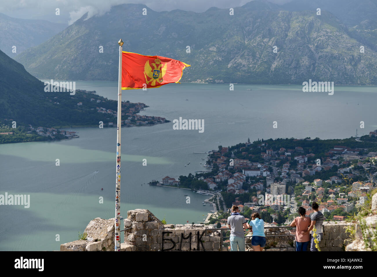 Panoramic view of the city of Kotor with the flag of Montenegro Stock ...