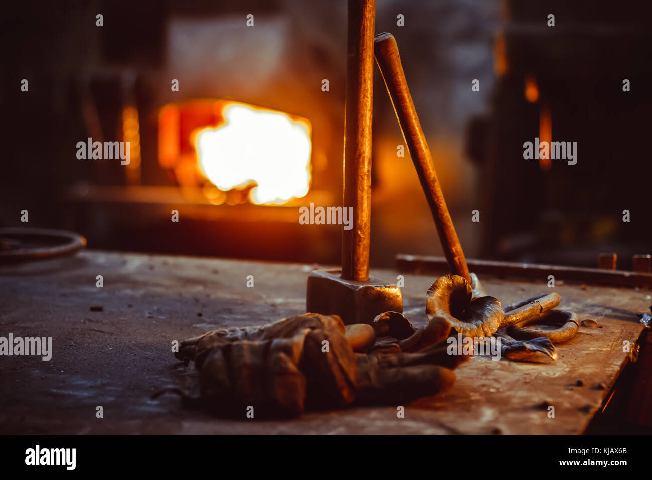 Tools in the forge Stock Photo - Alamy