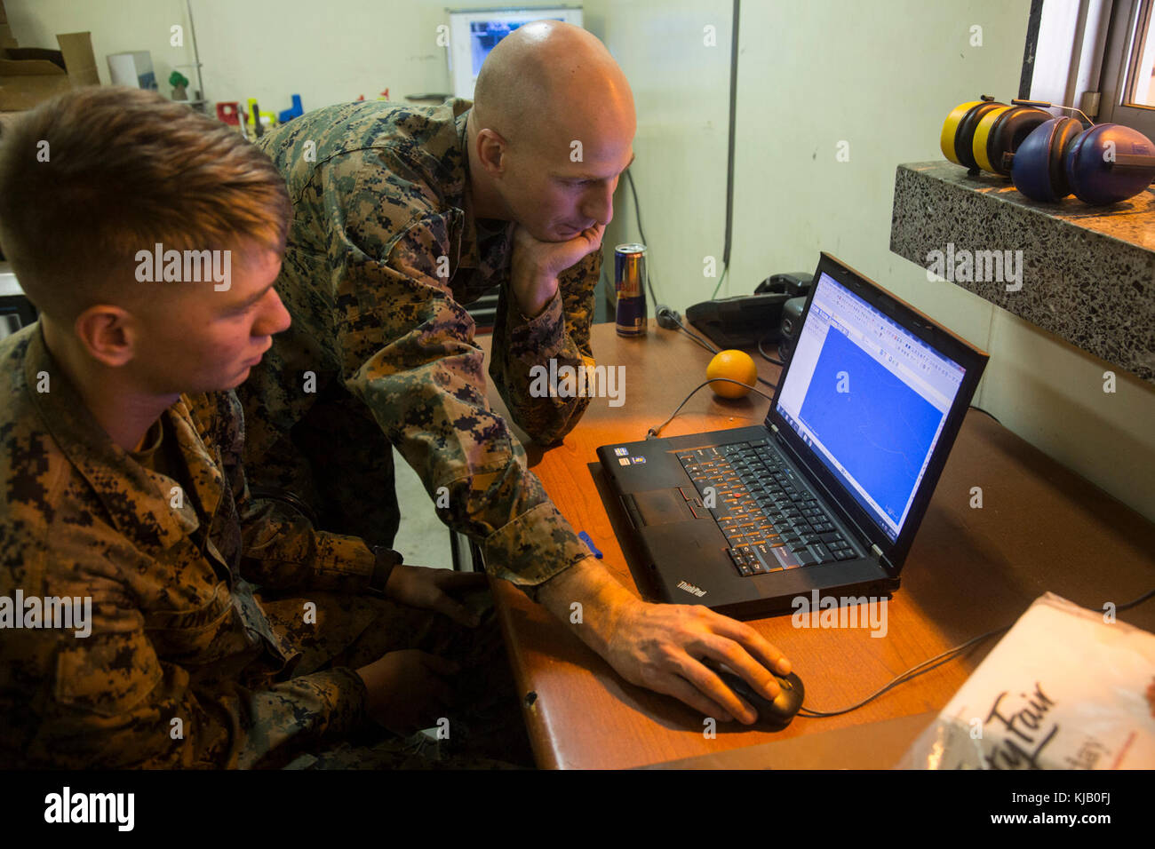 Gunnery Sgt. Justin A. Horn, right, the General Support Maintenance ...