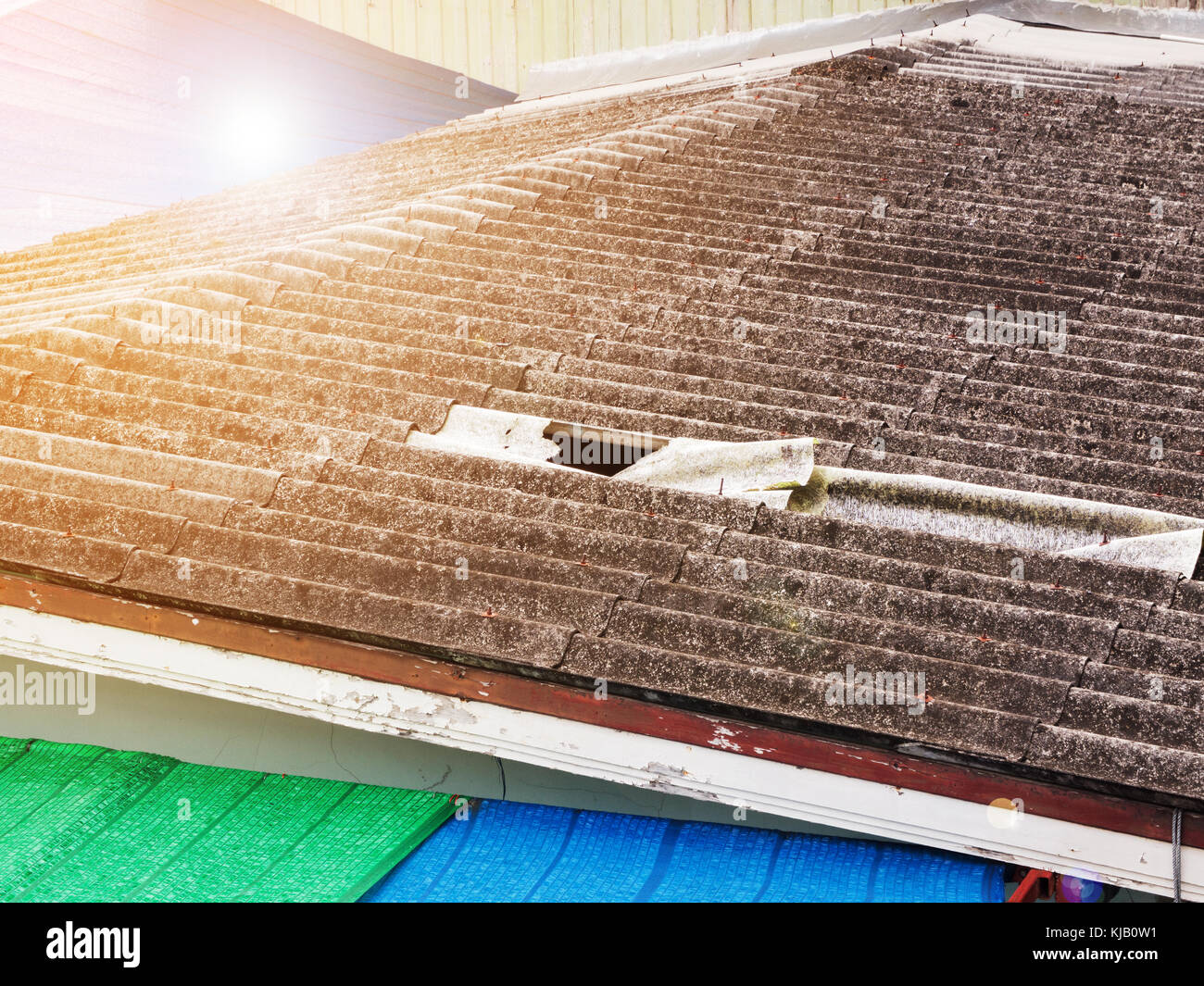 broken tile roof Stock Photo - Alamy