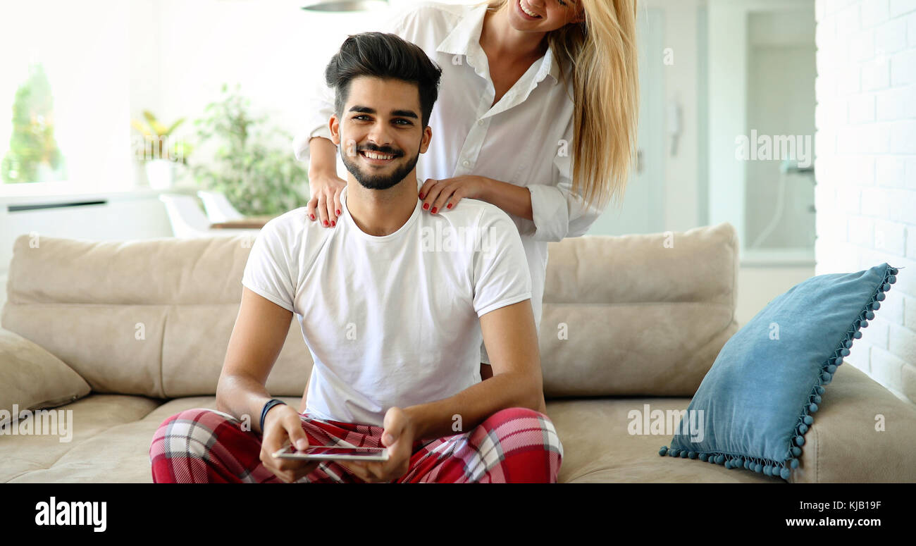 Woman giving massage to her boyfriend Stock Photo - Alamy
