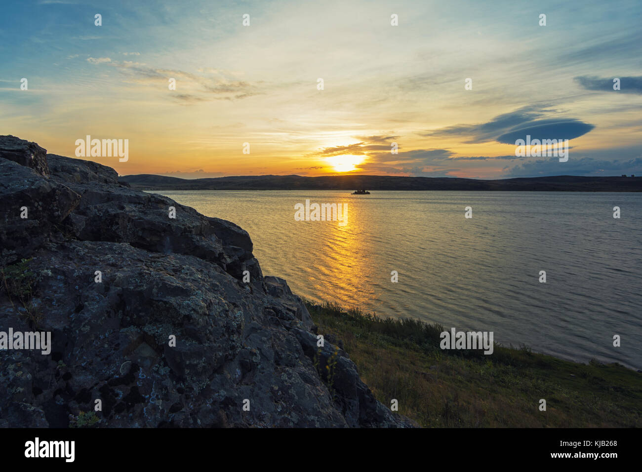 Sundawn at lake Stock Photo - Alamy