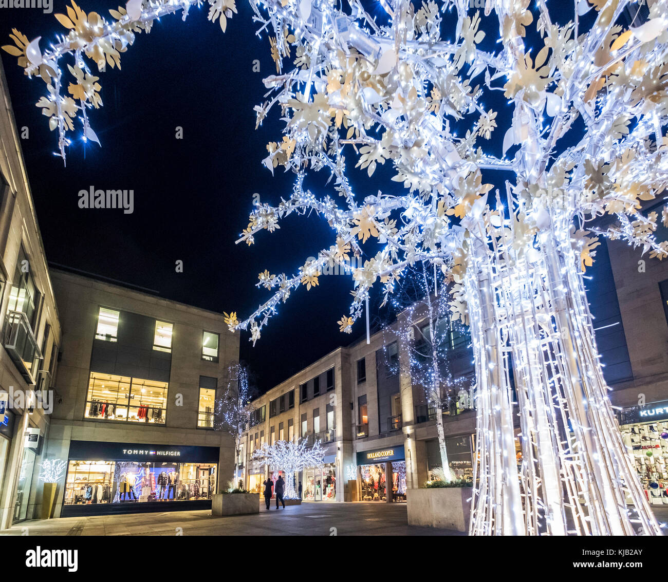 Night view of Multrees Walk upmarket shopping street with Christmas ...