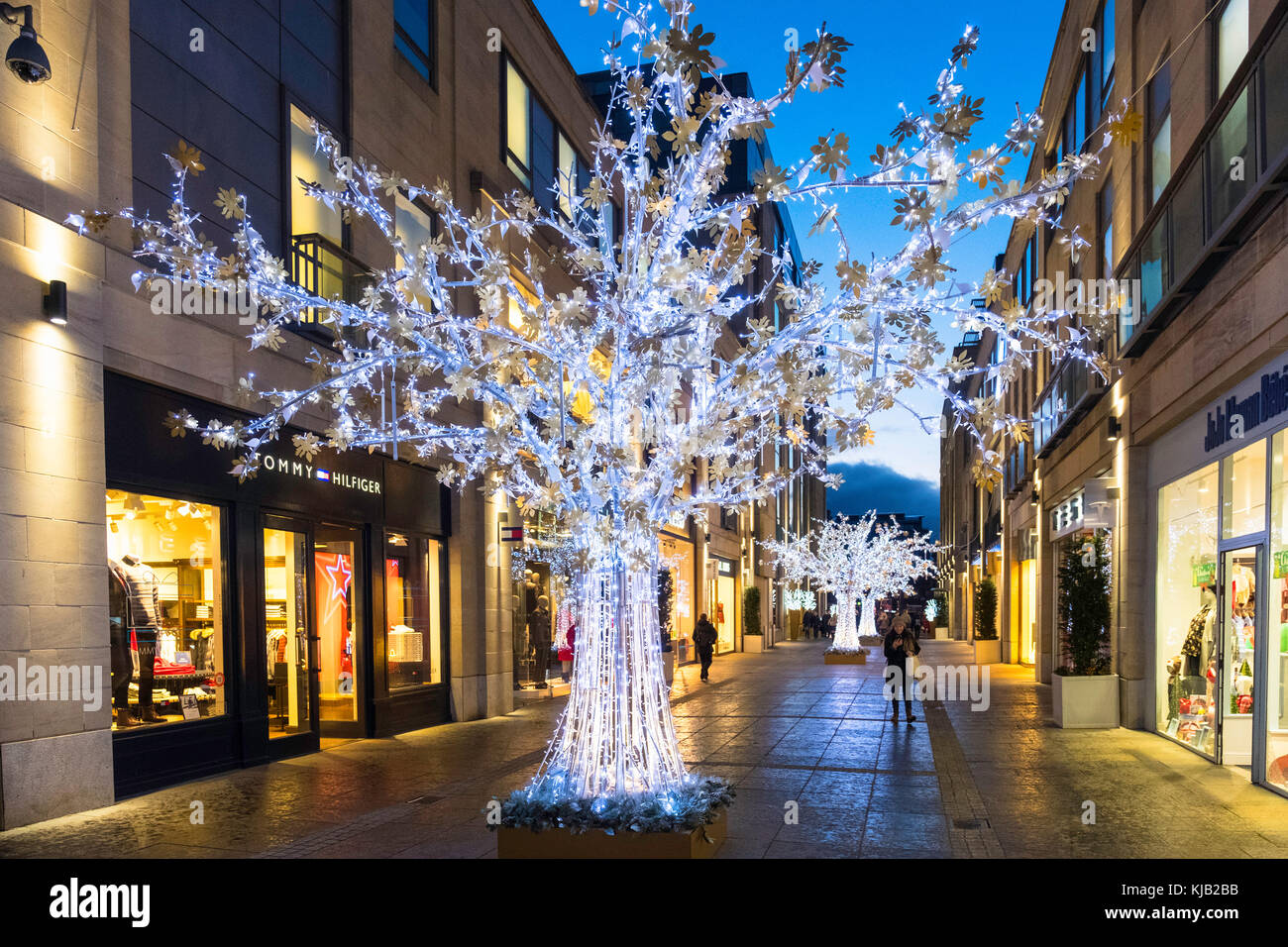 Night view of Multrees Walk upmarket shopping street with Christmas ...
