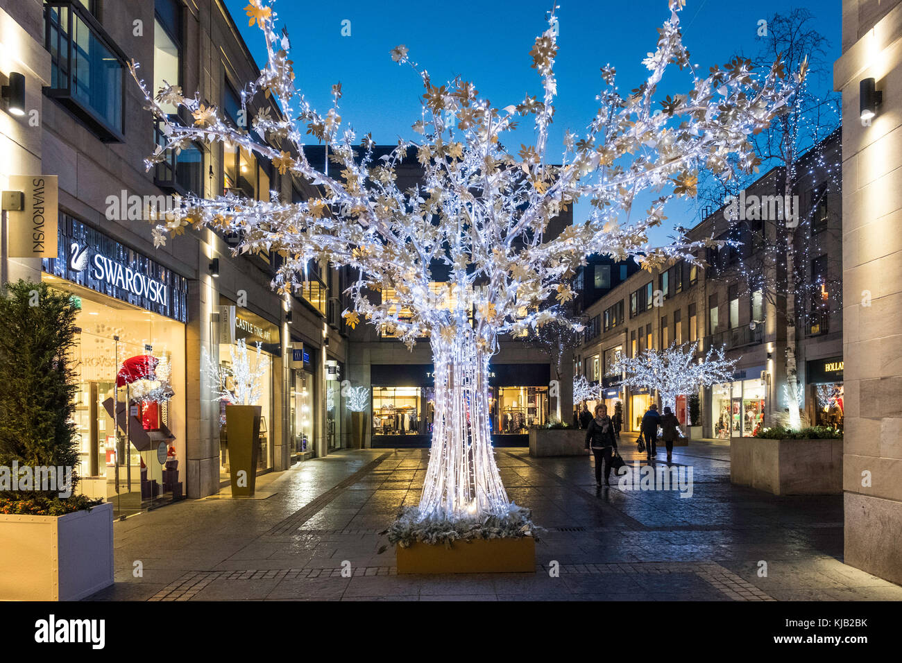 Night view of Multrees Walk upmarket shopping street with Christmas ...