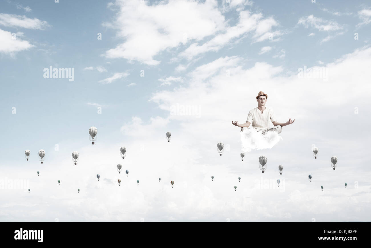 Young man keeping mind conscious Stock Photo - Alamy