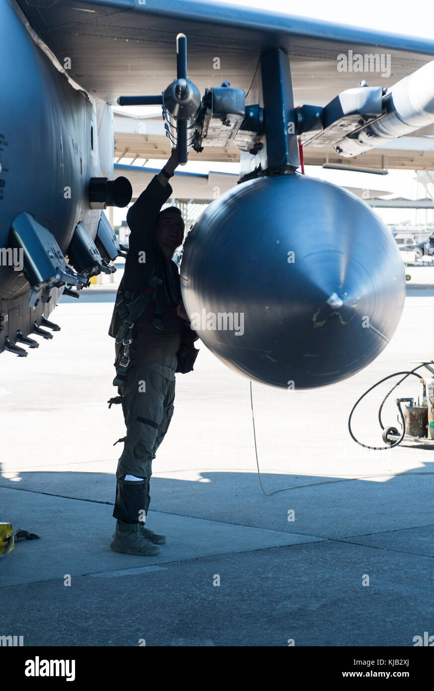 A pilot preforms a pre-check before takeoff during Checkered Flag 18-1 ...