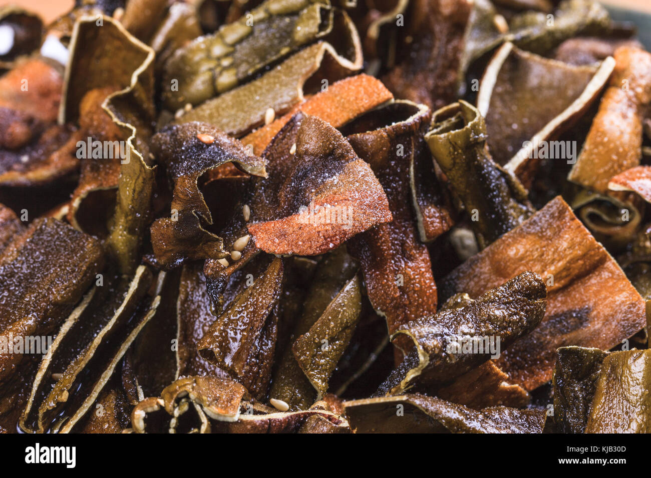 A close up of fried kelp, a common snack in Japan and Korea Stock Photo ...