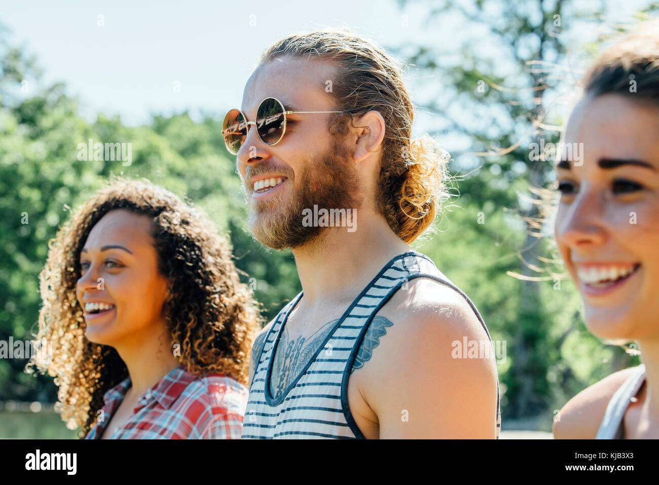 Close up of smiling friends Stock Photo - Alamy